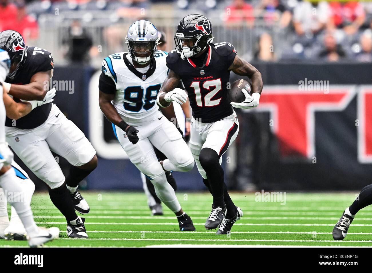 Houston Texans wide receiver Nico Collins (12) runs the ball against ...