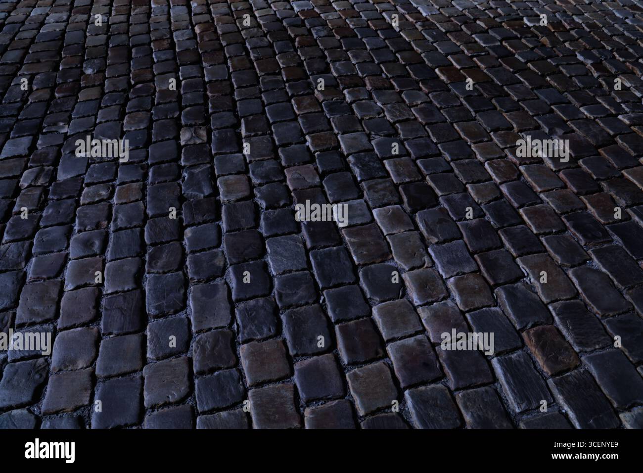 Stone paving background - night view porphyry cobblestone pattern in ...