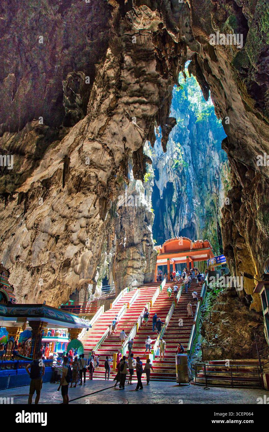 BATU CAVES, MALAYSIA - MARCH 17, 2024: Pilgrims visit Batu Caves temple ...