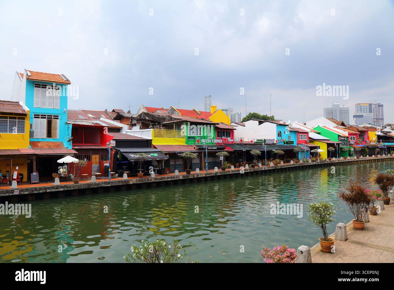 MALACCA, MALAYSIA - MARCH 15, 2024: People visit the River Walk of ...
