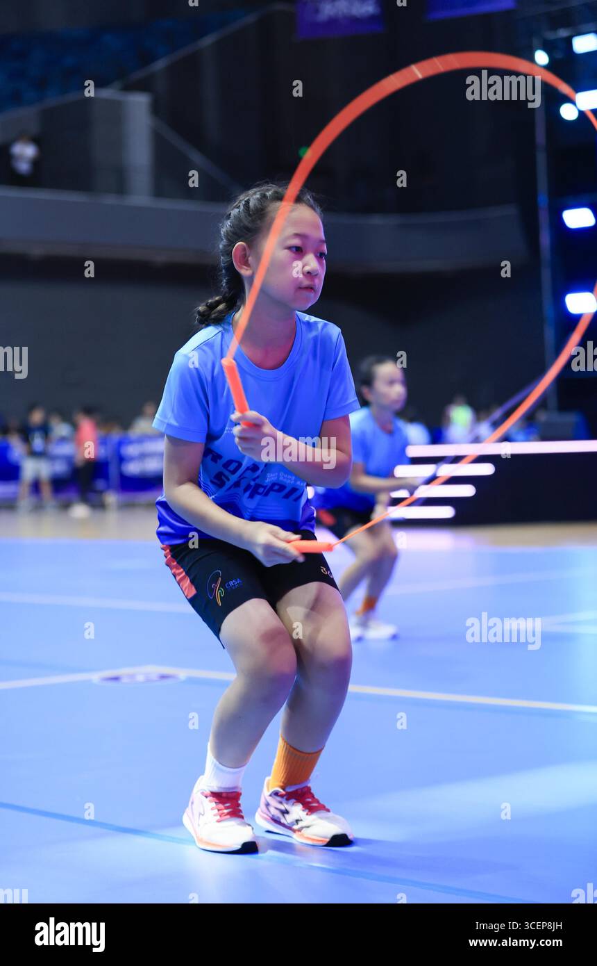 People take part in a rope-skipping competition in Huai'an City, east ...