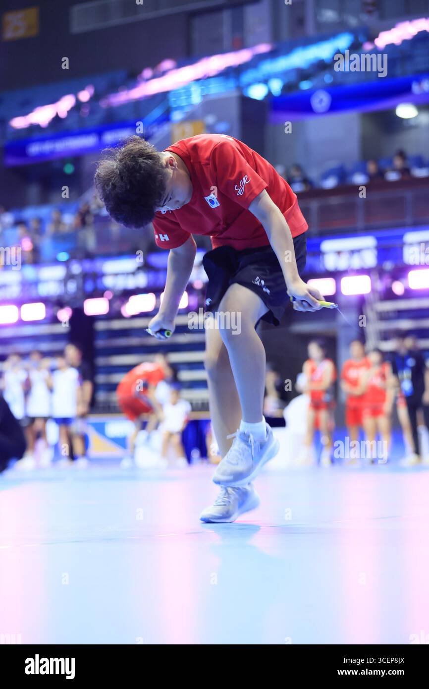 People take part in a rope-skipping competition in Huai'an City, east ...