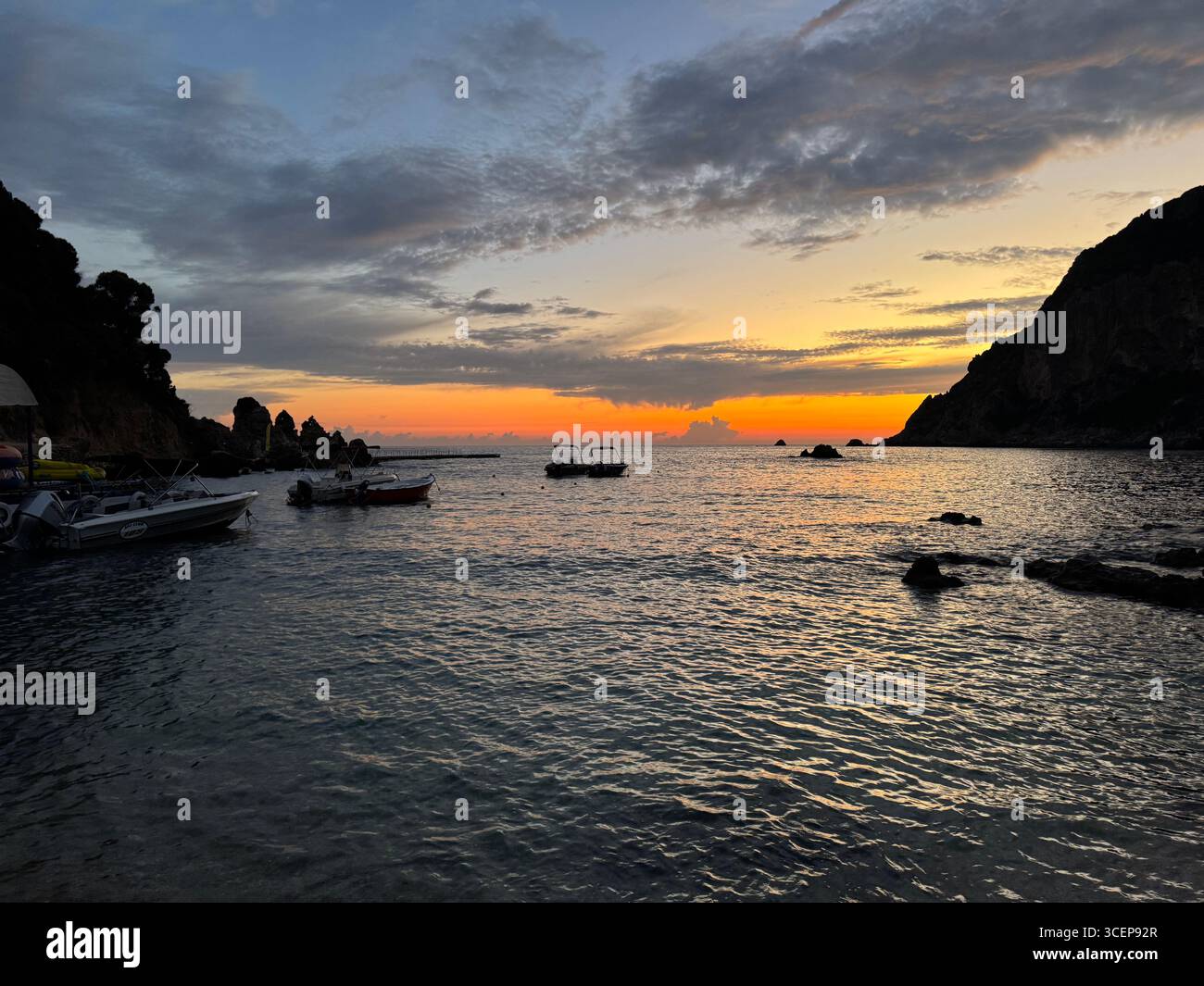 Sunset From Agios Petros Beach Paleokastritsa Corfu Greece Stock Sunset From Agios Petros Beach Paleokastritsa Corfu Greece Stock