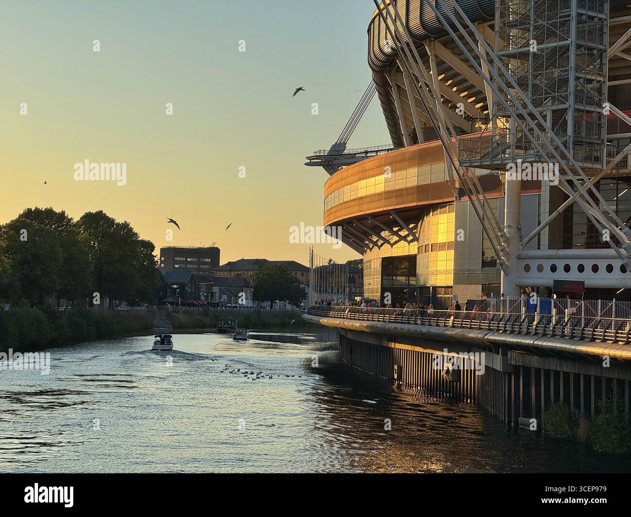 The Principality stadium alongside the river Taff, Cardiff, home of ...