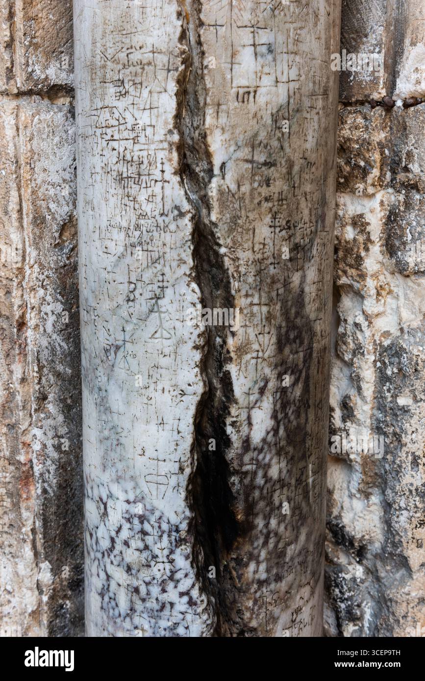 Marble column at the entrance to the Church of the Holy Sepulchre in ...