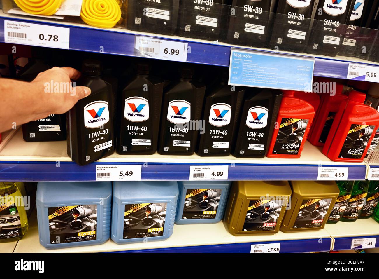Engine Lubricant shelf in store Stock Photo - Alamy