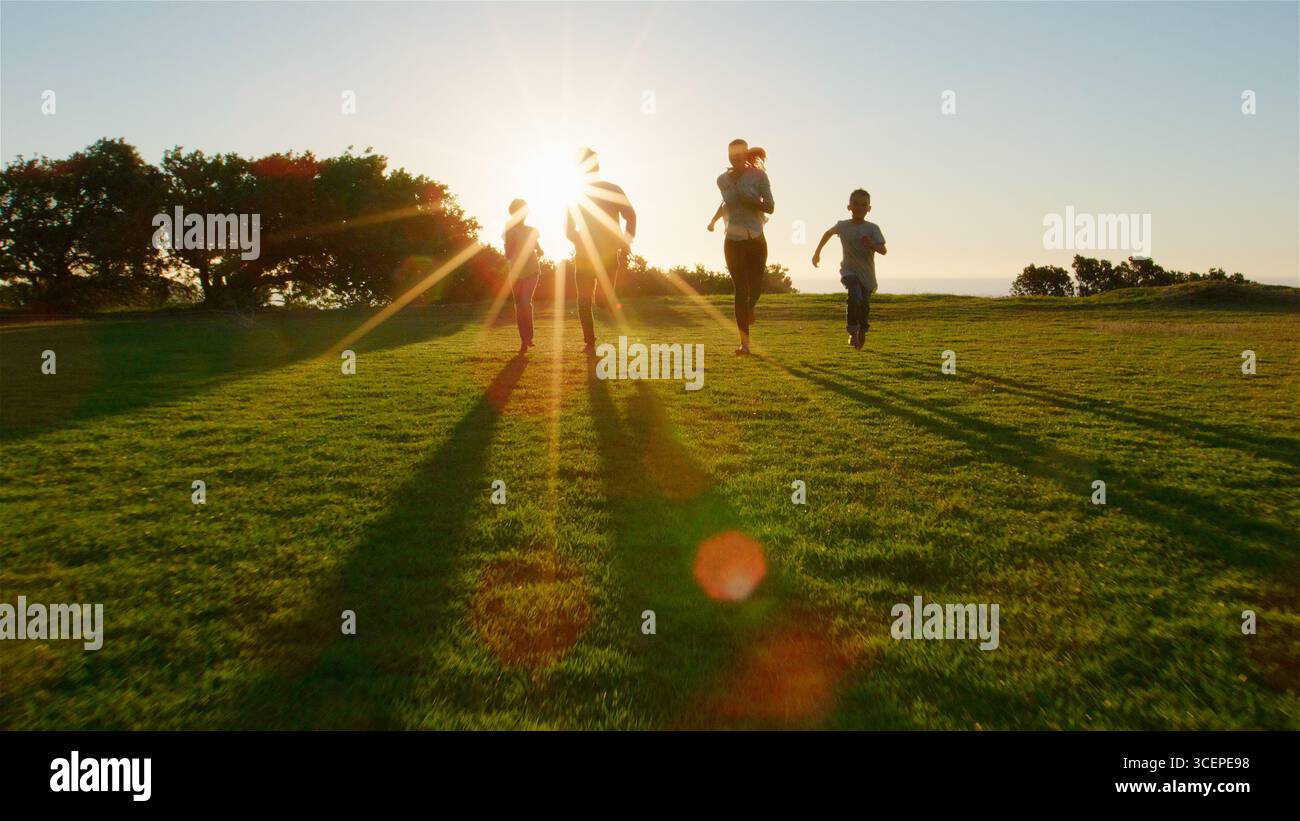 Father daughter running across field hi-res stock photography and ...
