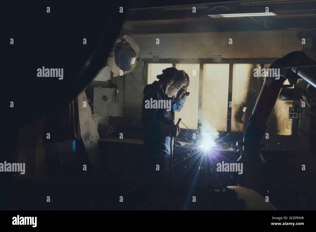 Welder on construction site welds hi-res stock photography and images ...