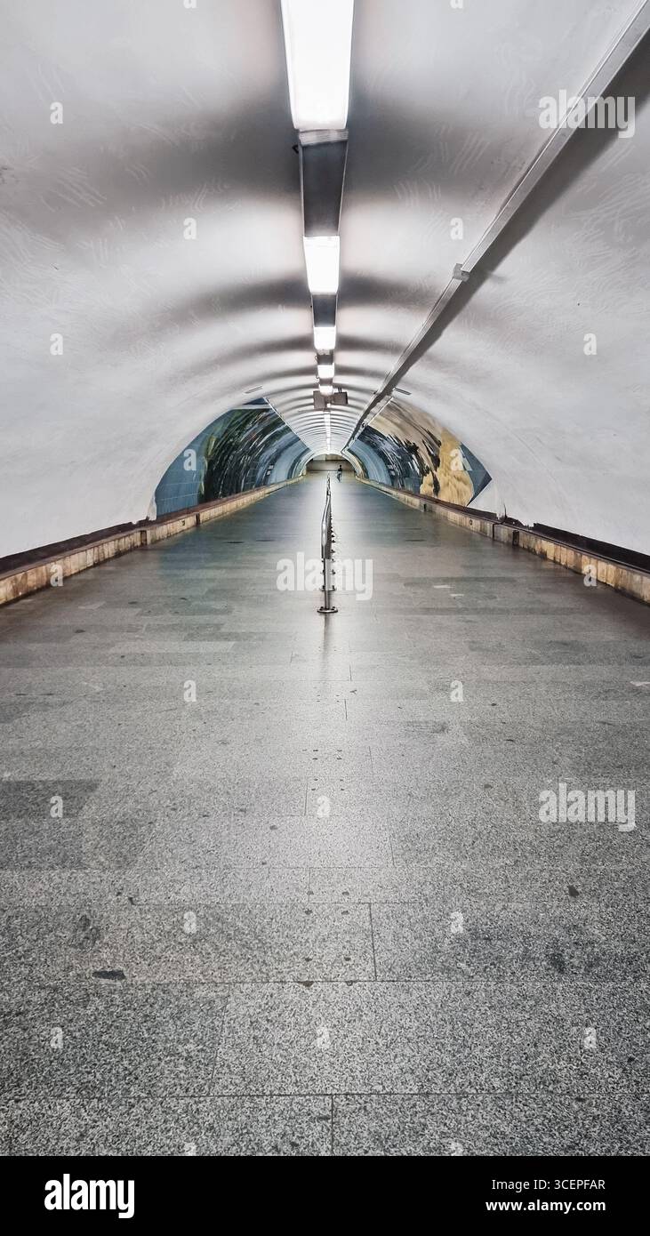 Empty subway walkway tunnel. Perspective view of white tube corridor ...
