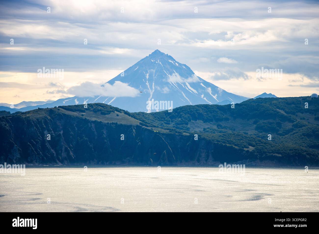 Vilyuchinsky volcano towers over Avacha Bay in Kamchatka majestic ...