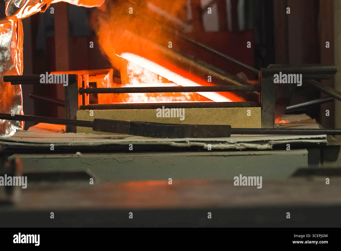 Testing gold in a smelting furnace Stock Photo - Alamy