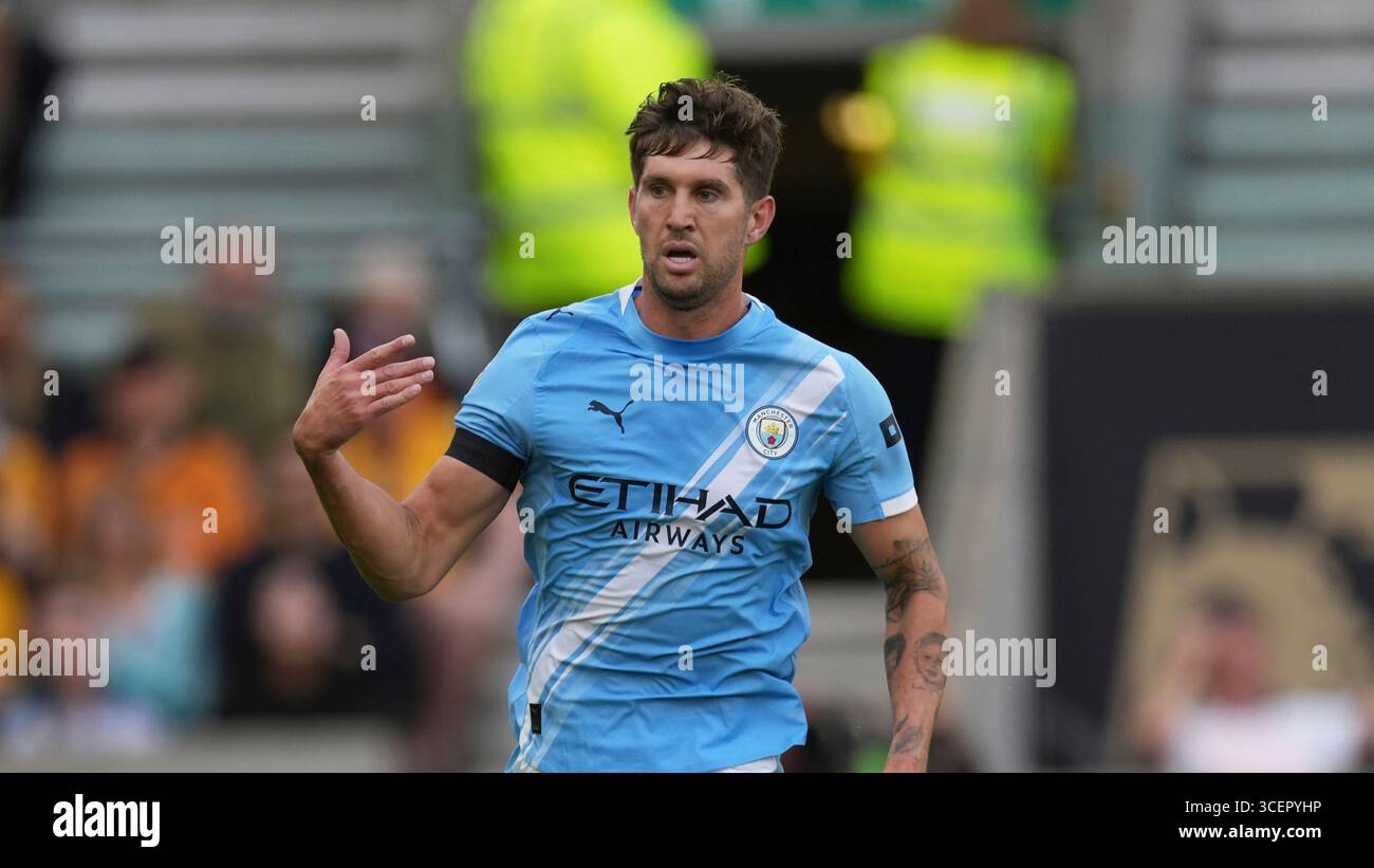 Manchester City's John Stones controls the ball during the English ...