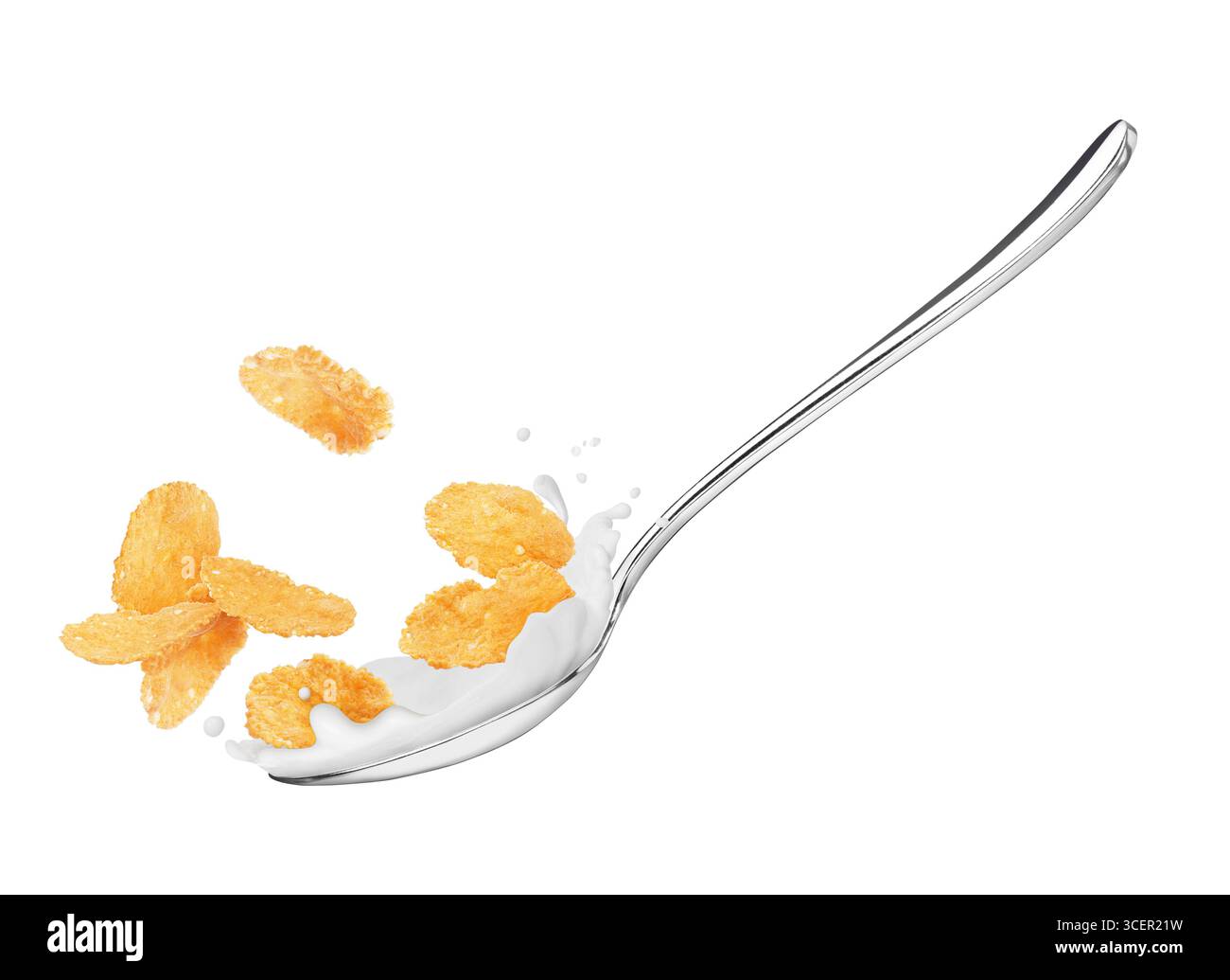 Corn flakes in a spoon with milk close-up, isolated on white background ...