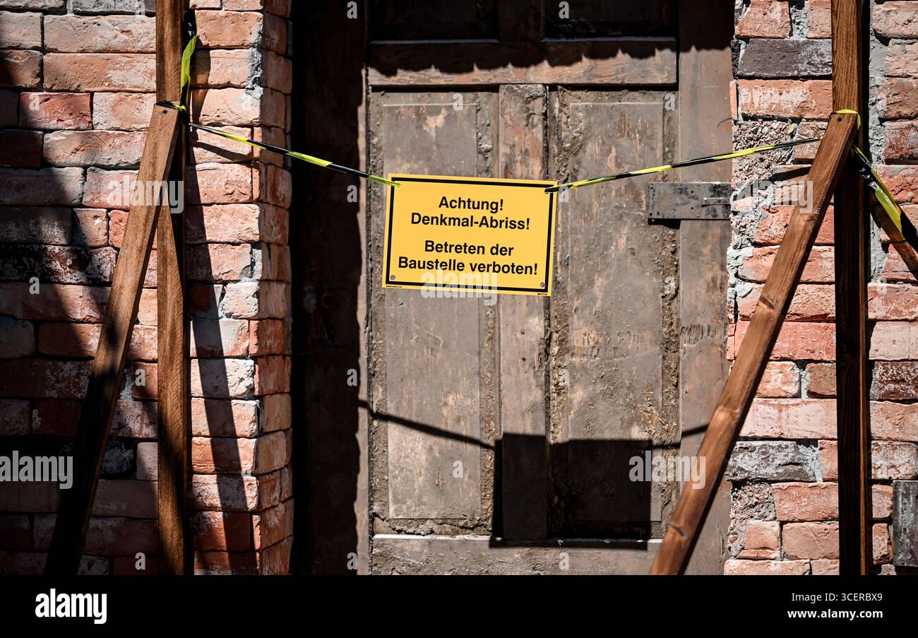 19 August 2025, Berlin: With a sign reading "Attention! Monument ...