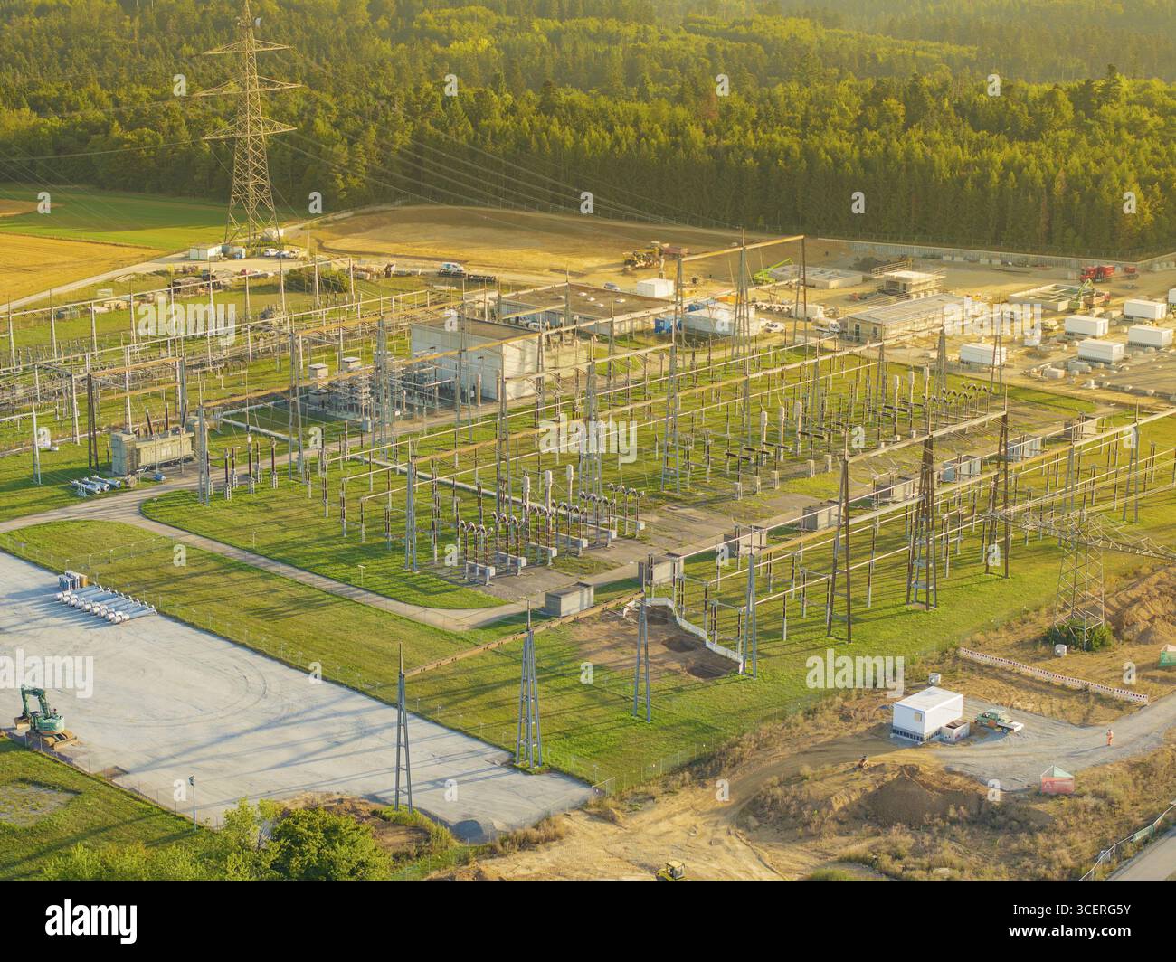 Substation with complex steel structures and technology surrounded by ...