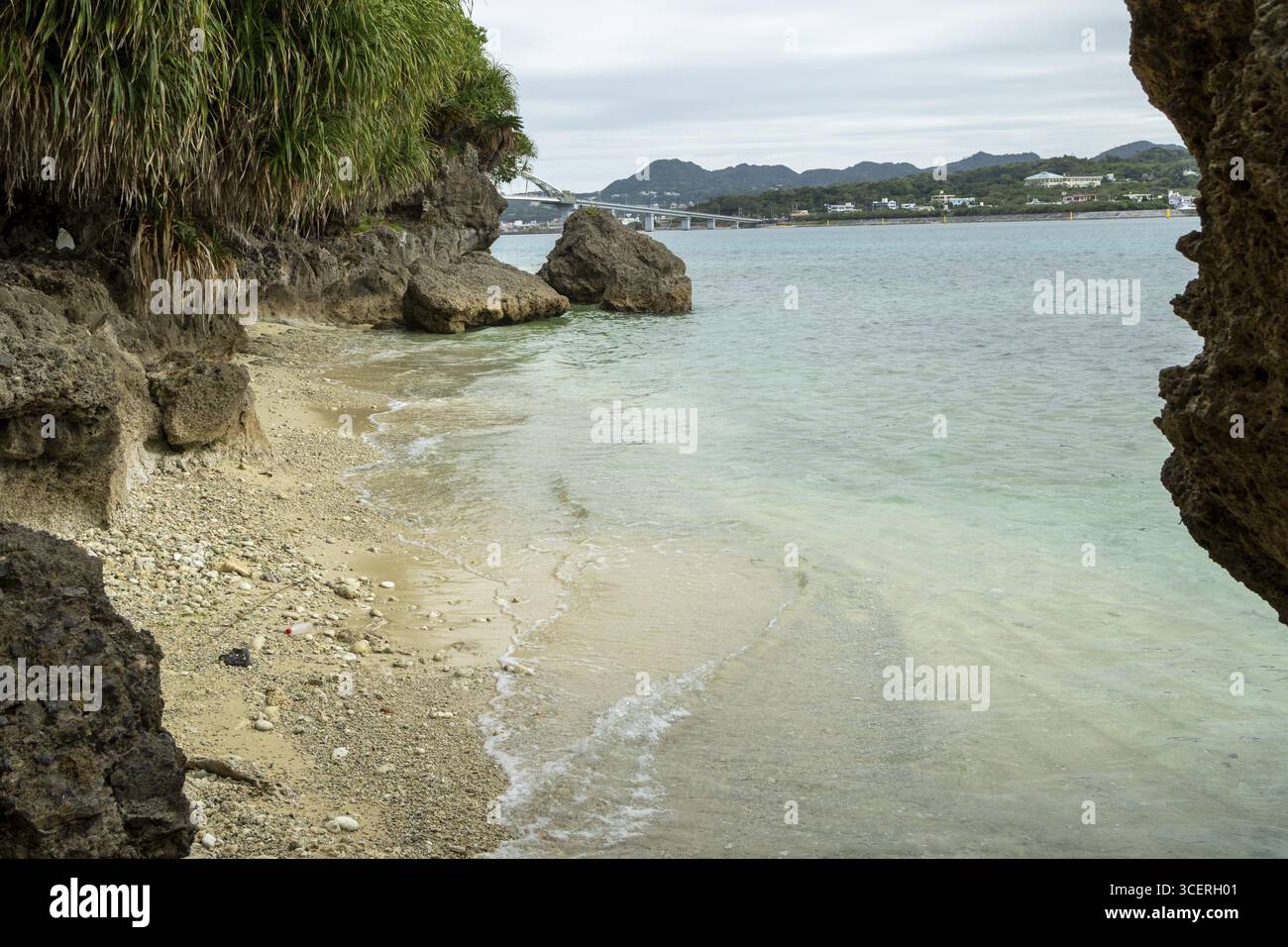 Lover Beach, volcanic rocks and vegetation on the beach of Sesoko-jima ...