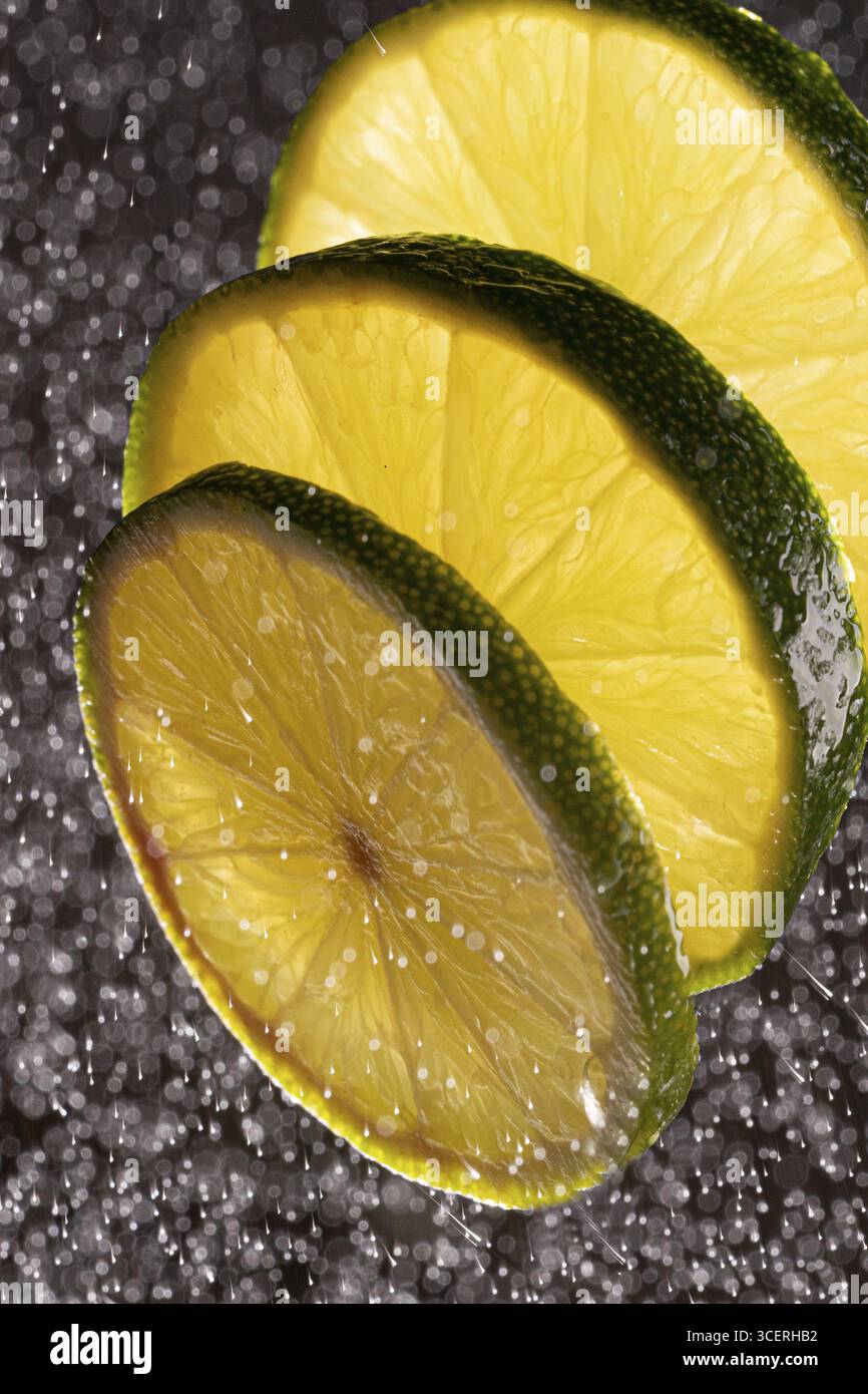 Sliced lemon water drops hi-res stock photography and images - Alamy