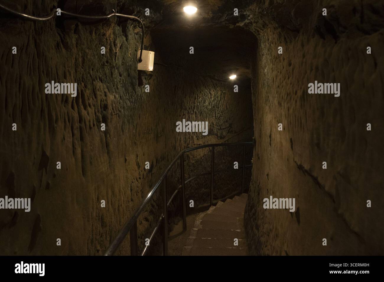 Sparsely lit tunnel, sight Japanese Navy Underground Headquarters ...