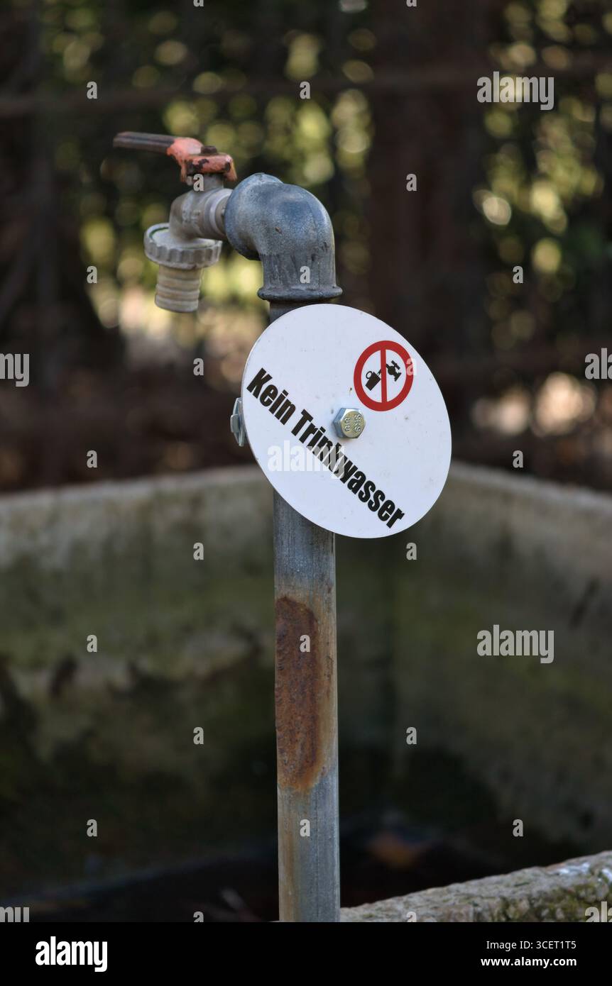 Old Outdoor Faucet With Warning Sign "Not For Drinking Water", Rusty ...
