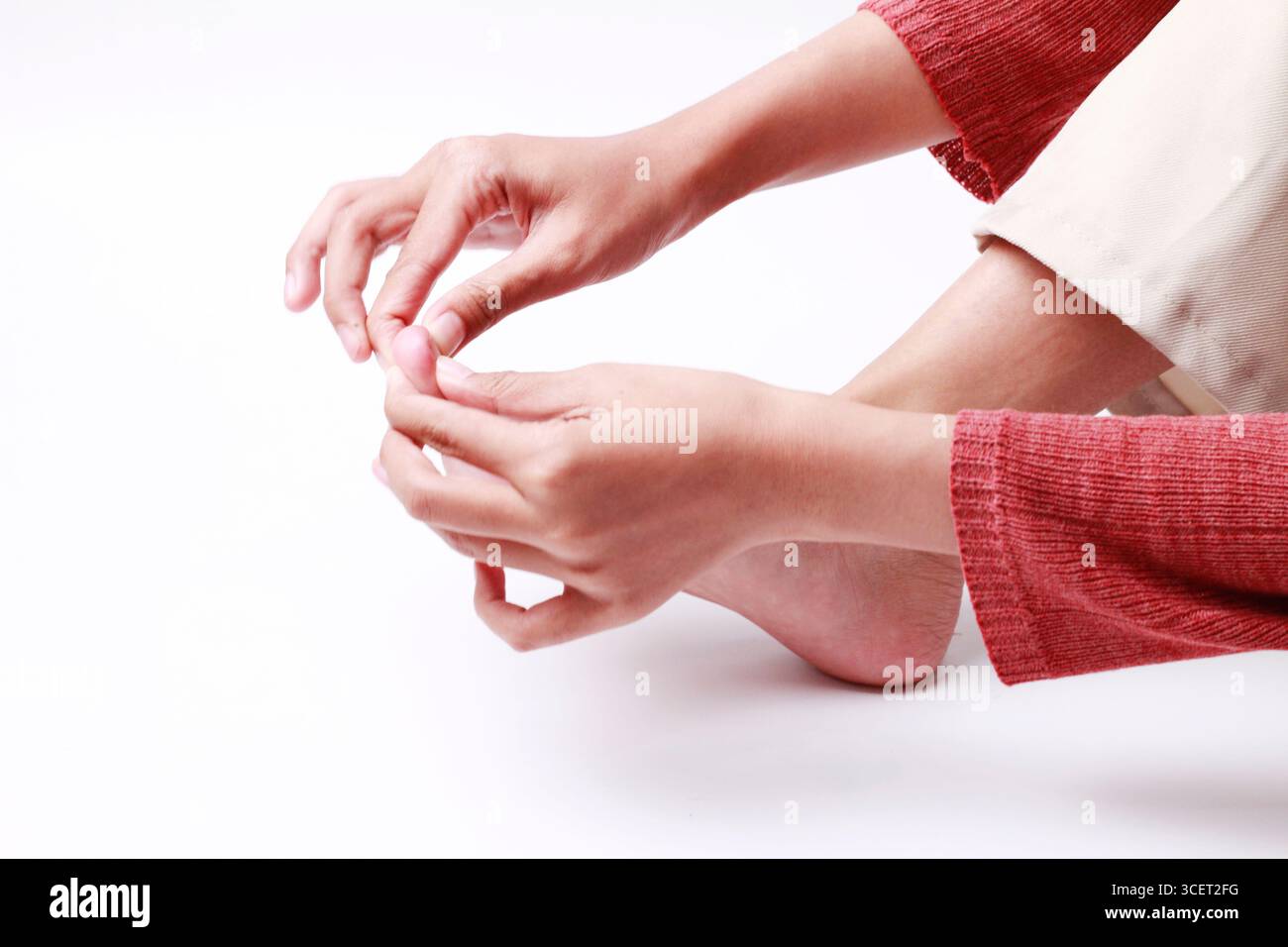 Problems with feet, woman's hands holding feet, foot joints and ankles ...