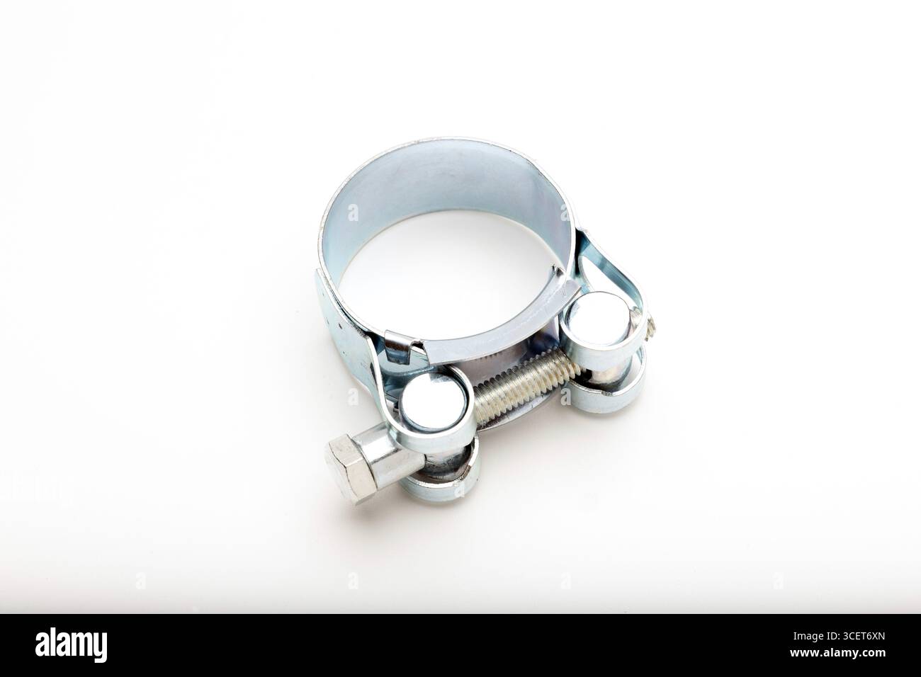 Metal pipe clamp with a shiny finish. Designed for securing pipes in ...