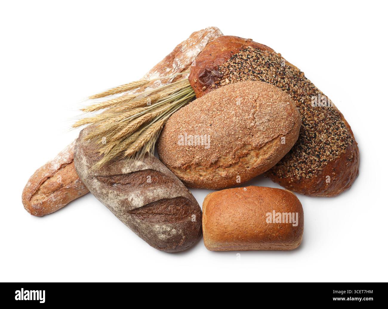 Different types of bread and wheat spikes isolated on white, top view ...