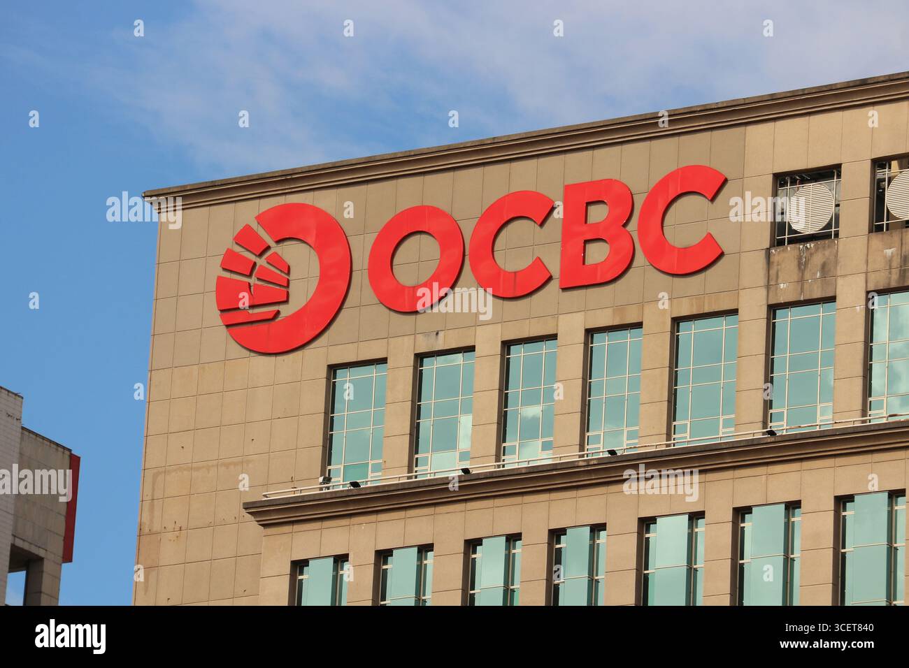 OCBC Bank logo on modern skyscraper – Asian financial district, urban ...
