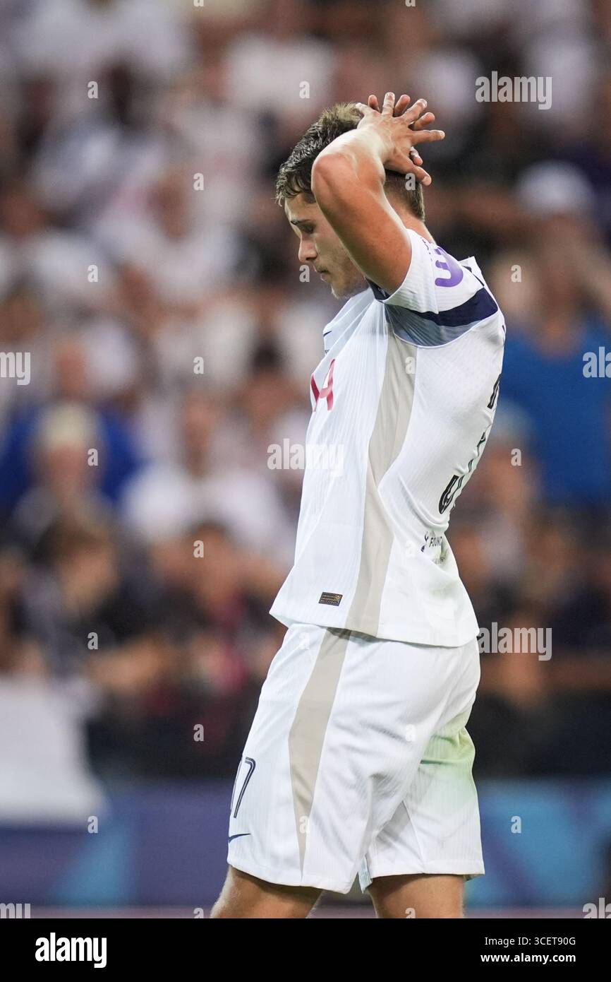 Tottenham's Micky van de Ven reacts after missing a scoring chance ...