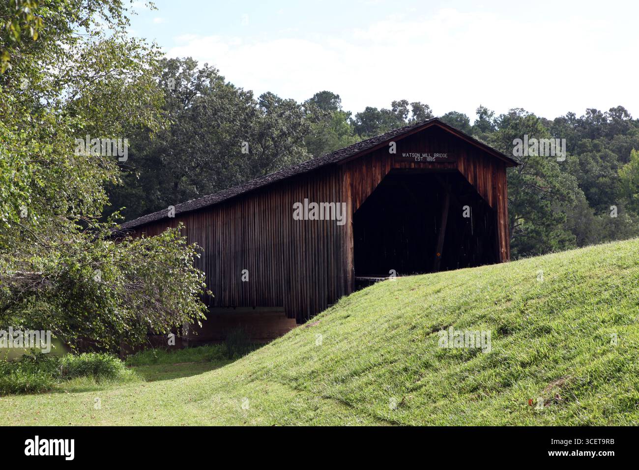 A view of the historic covered bridge at Watson Mill Bridge State Park ...