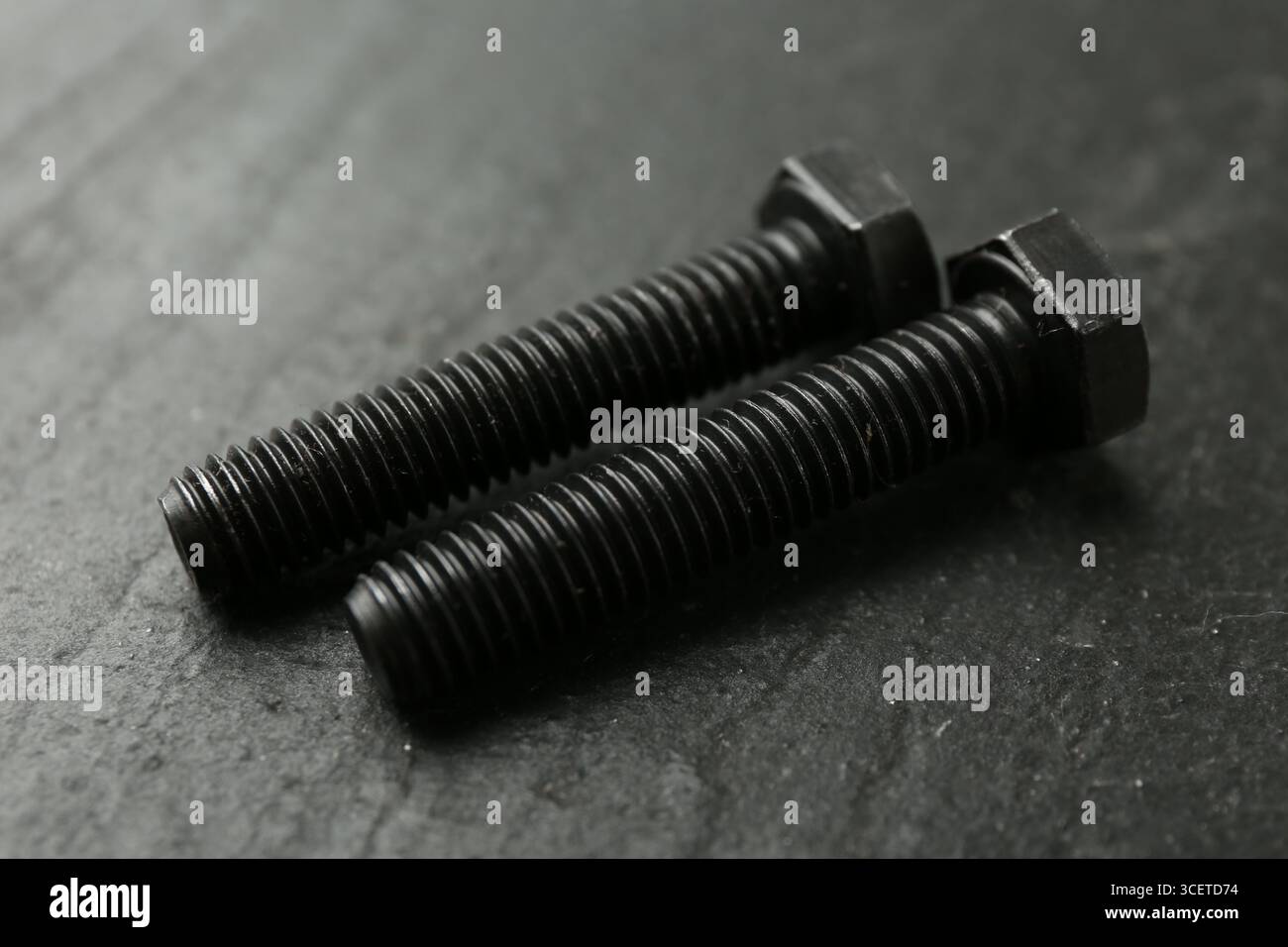 Two black metal bolts hi-res stock photography and images - Alamy