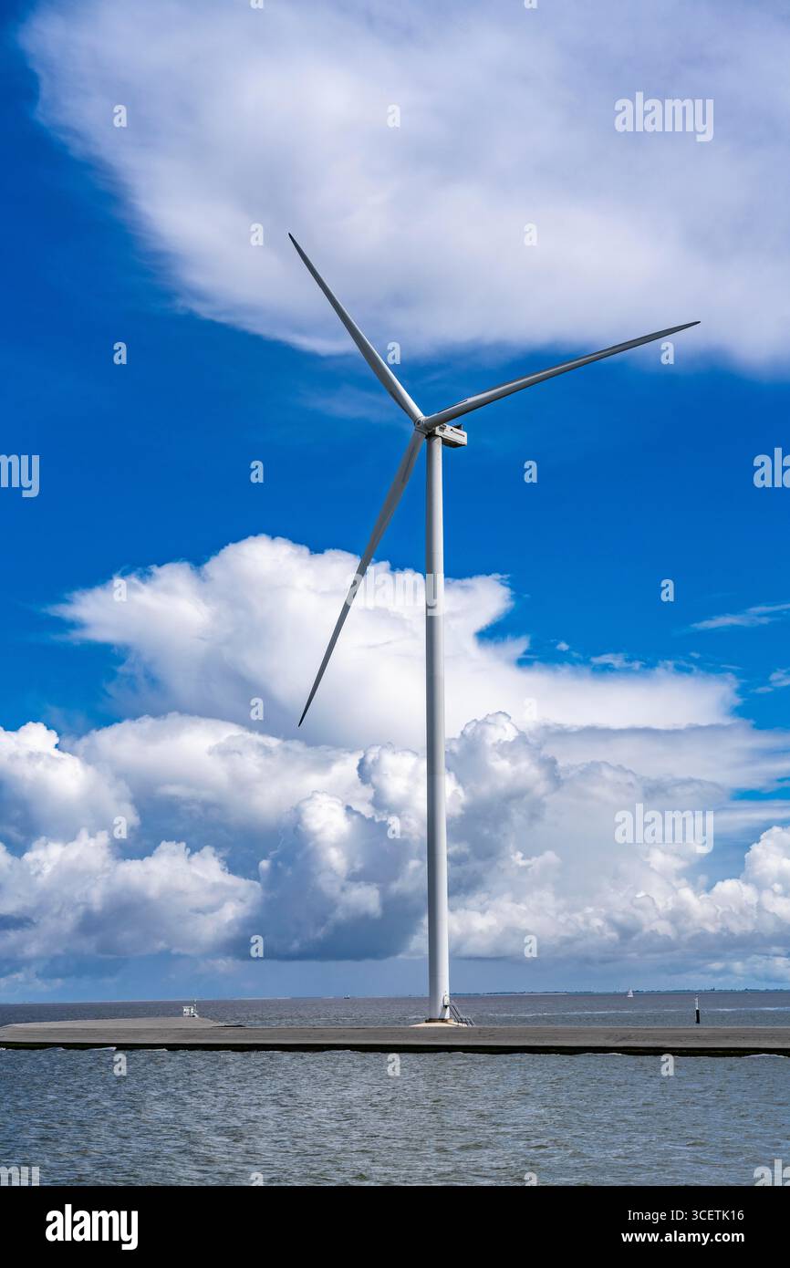 Strekdammen Wind Farm, wind farm at the seaport of Eemshaven in the ...