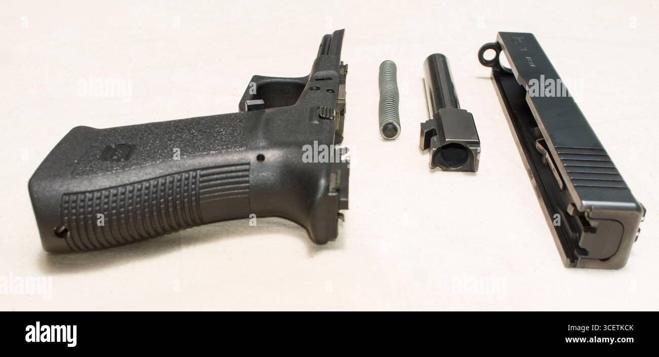 Parts of a disassembled Glock 21 semi auto pistol in .45 ACP caliber ...