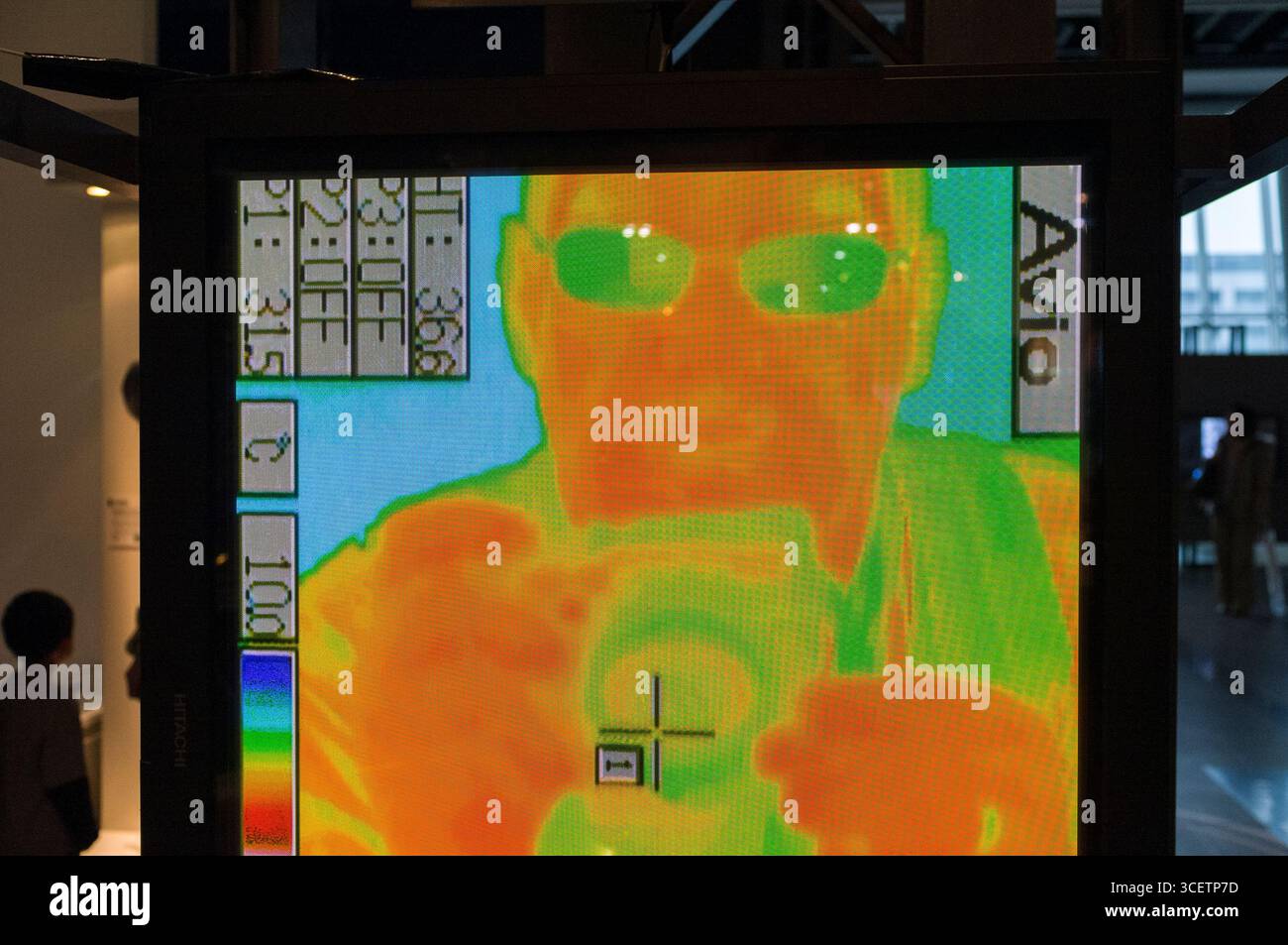 Photographer self portrait using a thermal camera inside the Miraikan ...