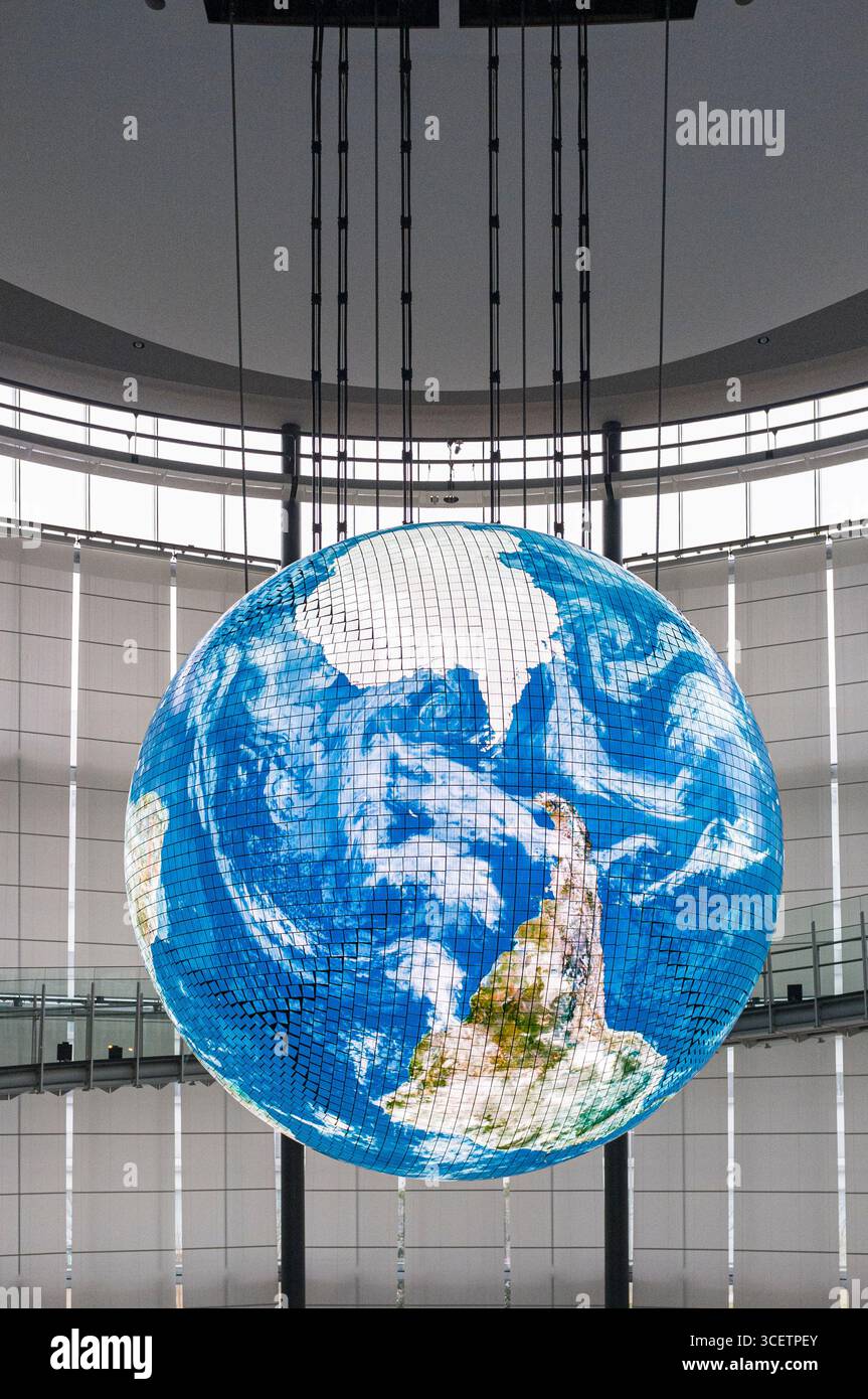 Showing planet earth emerging hi-res stock photography and images - Alamy