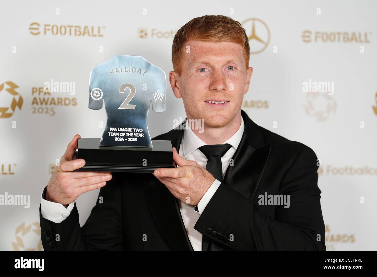 Brad Halliday with his PFA League Two Team Of The Year award during the PFA Awards 2025 at ...