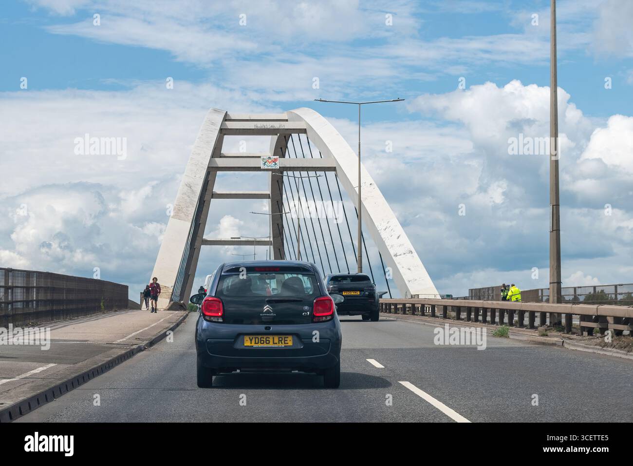 Cars traffic driving over Newport City Bridge over the River Usk ...