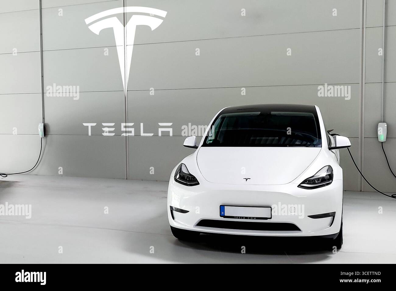 Bavaria, Germany August 19, 2025: A Tesla electric car charging in a ...