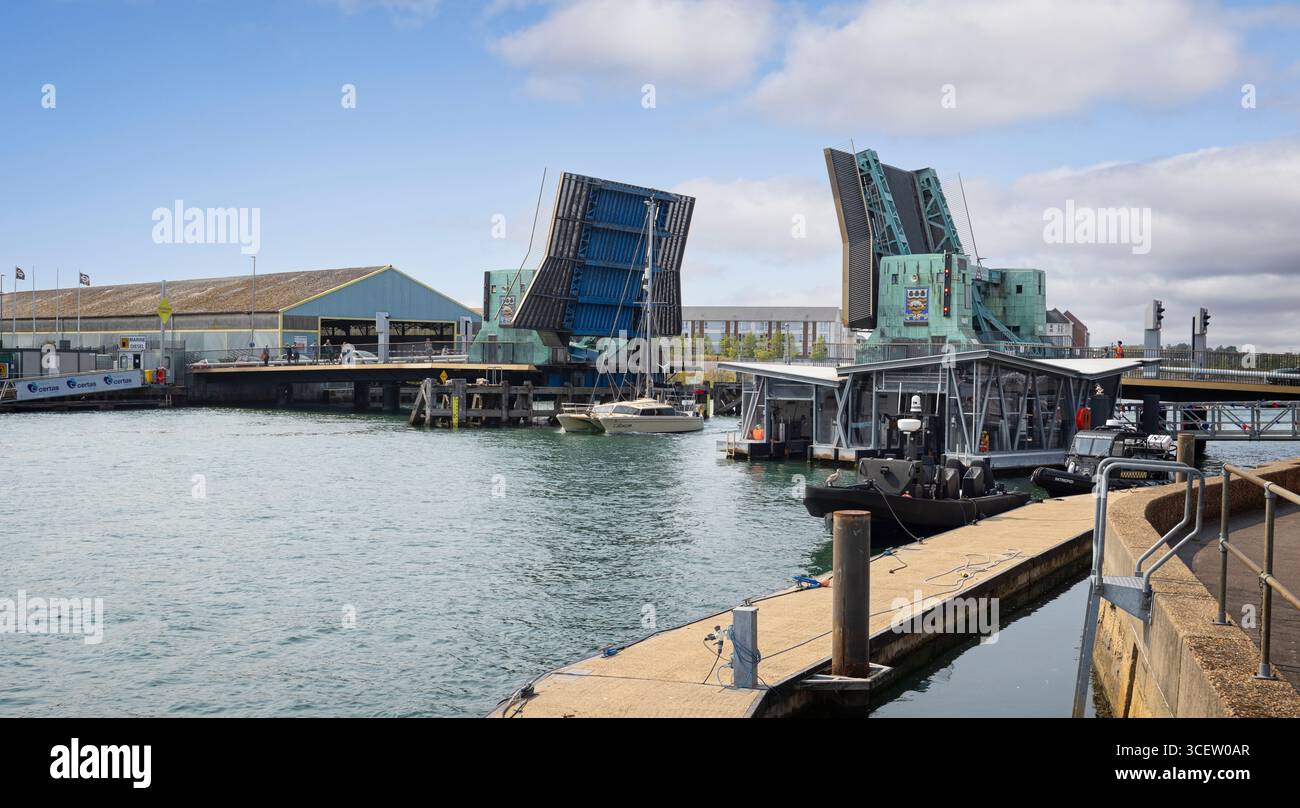 Poole Bridge fully open as catamaran sails through in Poole, Dorset, UK ...