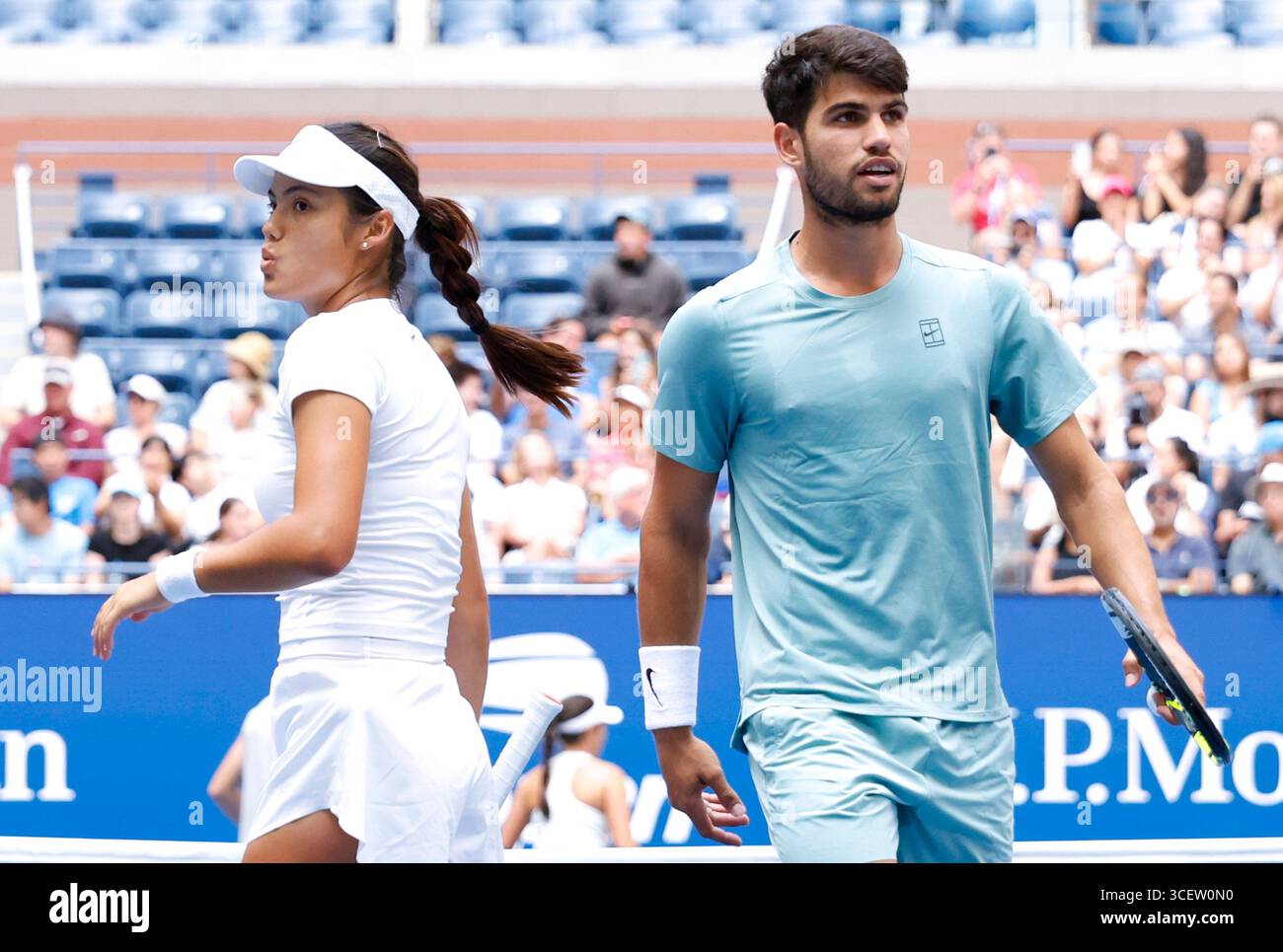 Emma Raducanu of Great Britain and Carlos Alcaraz of Spain react after ...