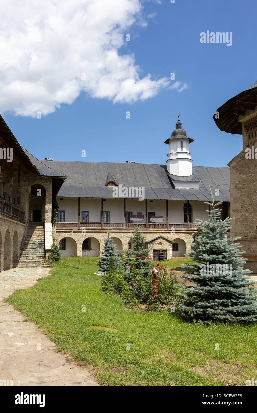 inner courtyard of a romanian orthodox monastery, featuring historic ...