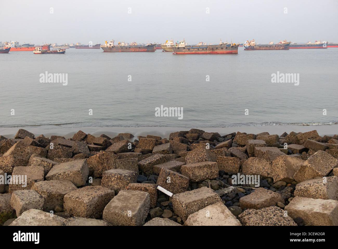 Massive cargo ships floating calmly on horizon of Bay of Bengal near ...