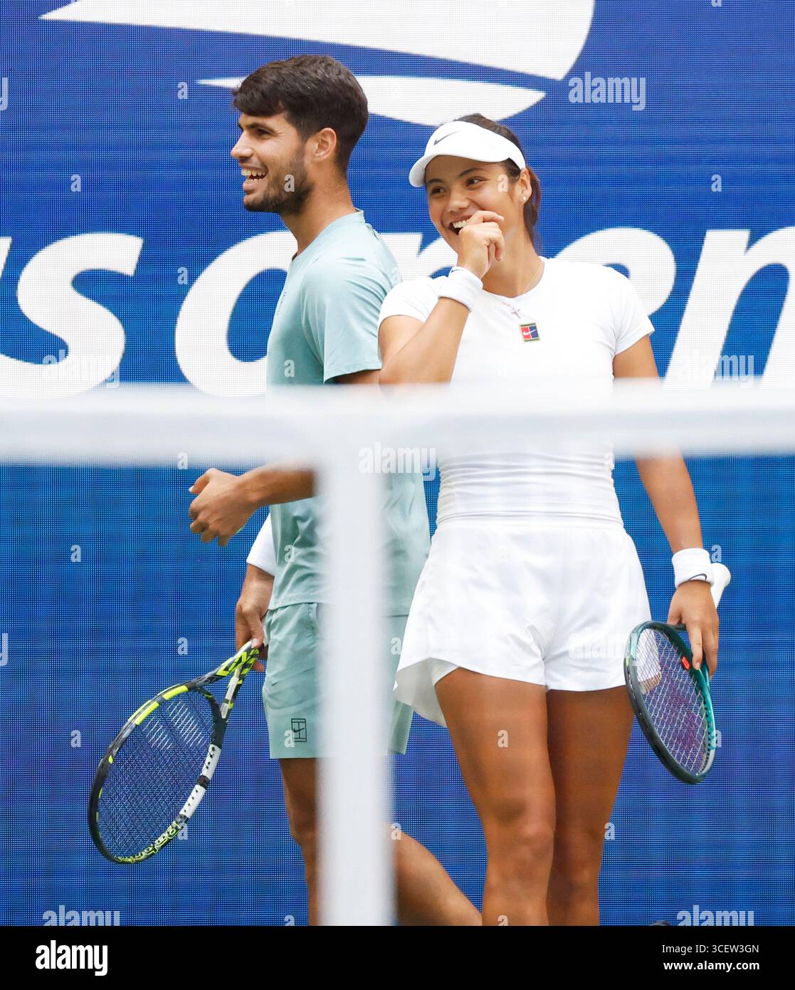 Emma Raducanu of Great Britain and Carlos Alcaraz of Spain react after ...