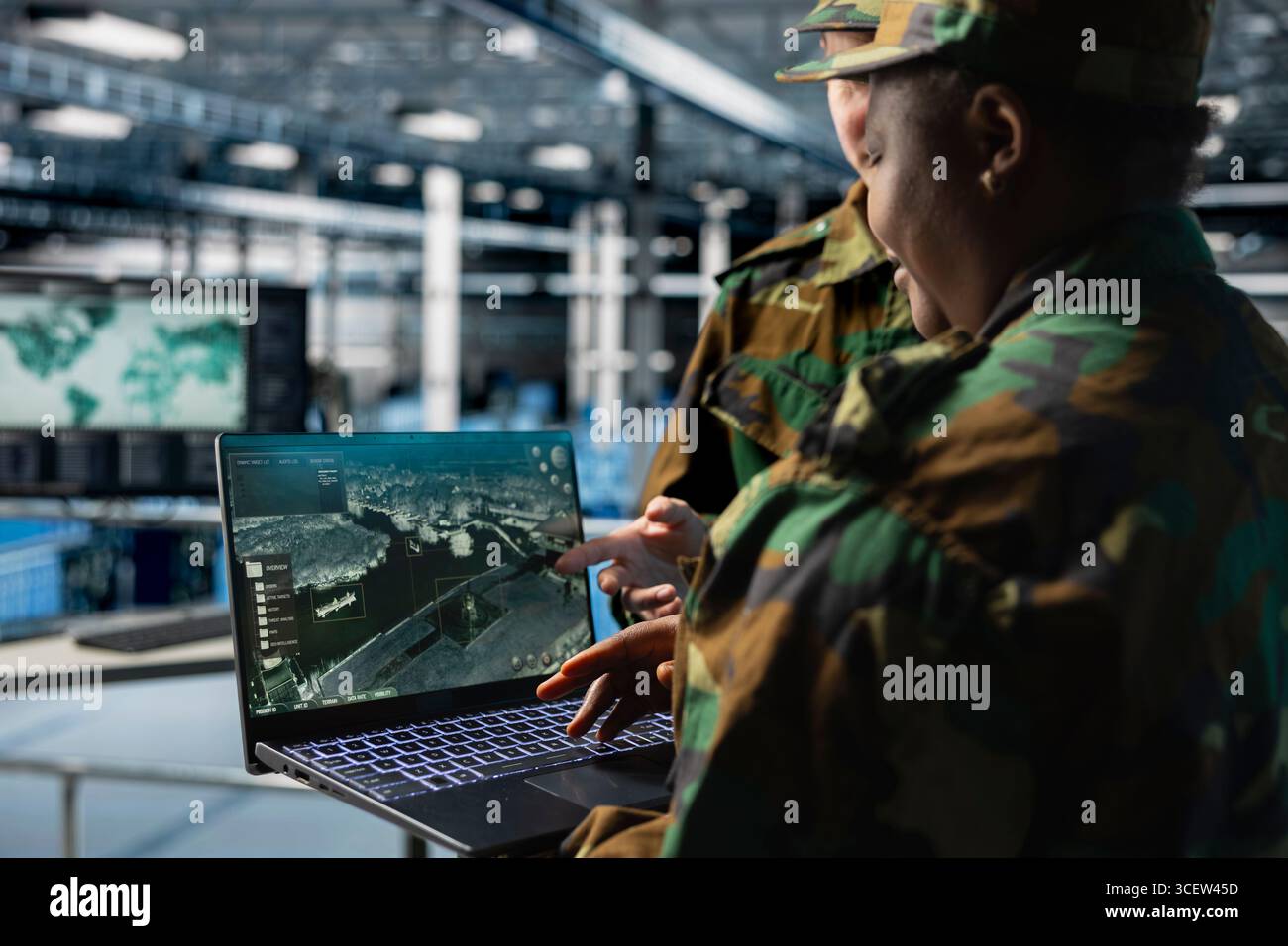 Team of army experts in data center reviewing satellite intelligence ...