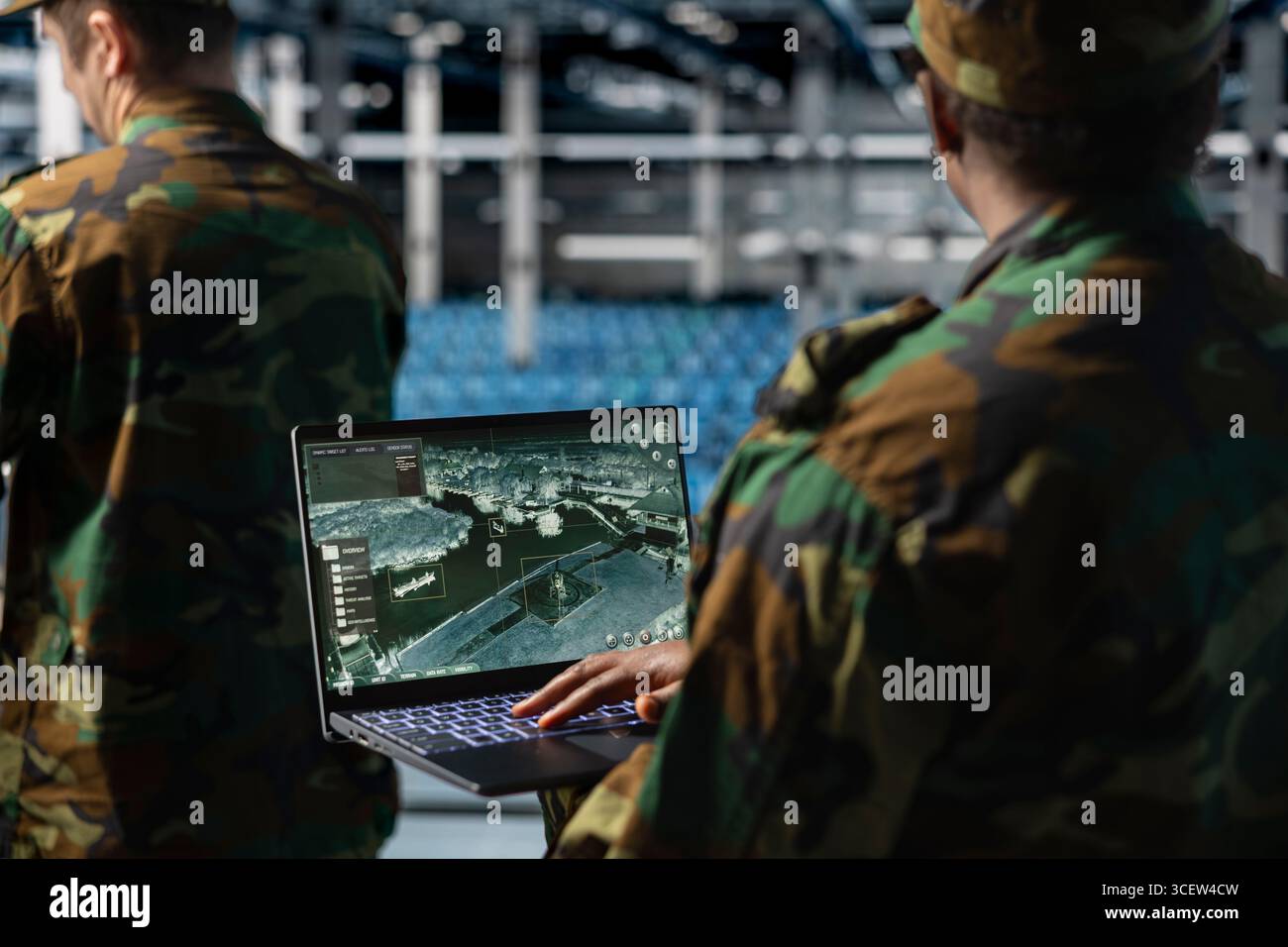Intelligence agency specialist scanning hi-res stock photography and ...
