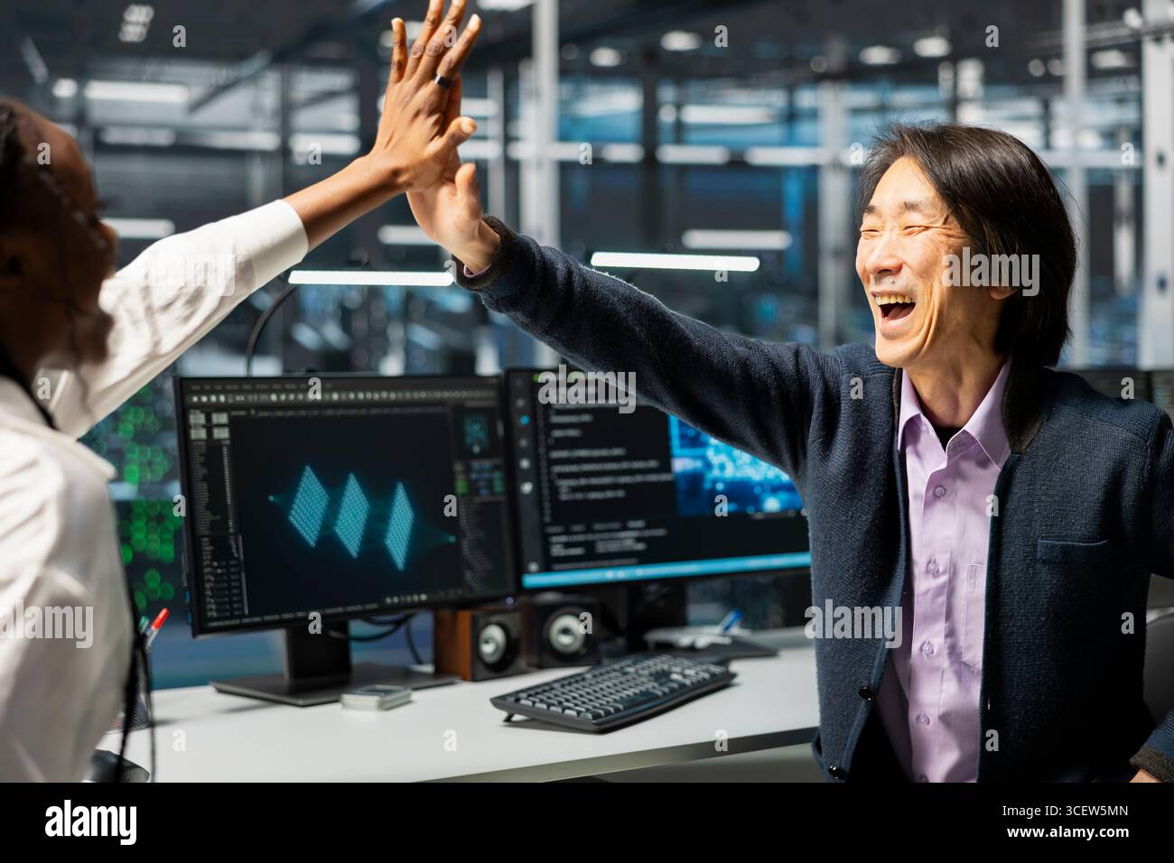 Overjoyed data center engineer hi-res stock photography and images - Alamy