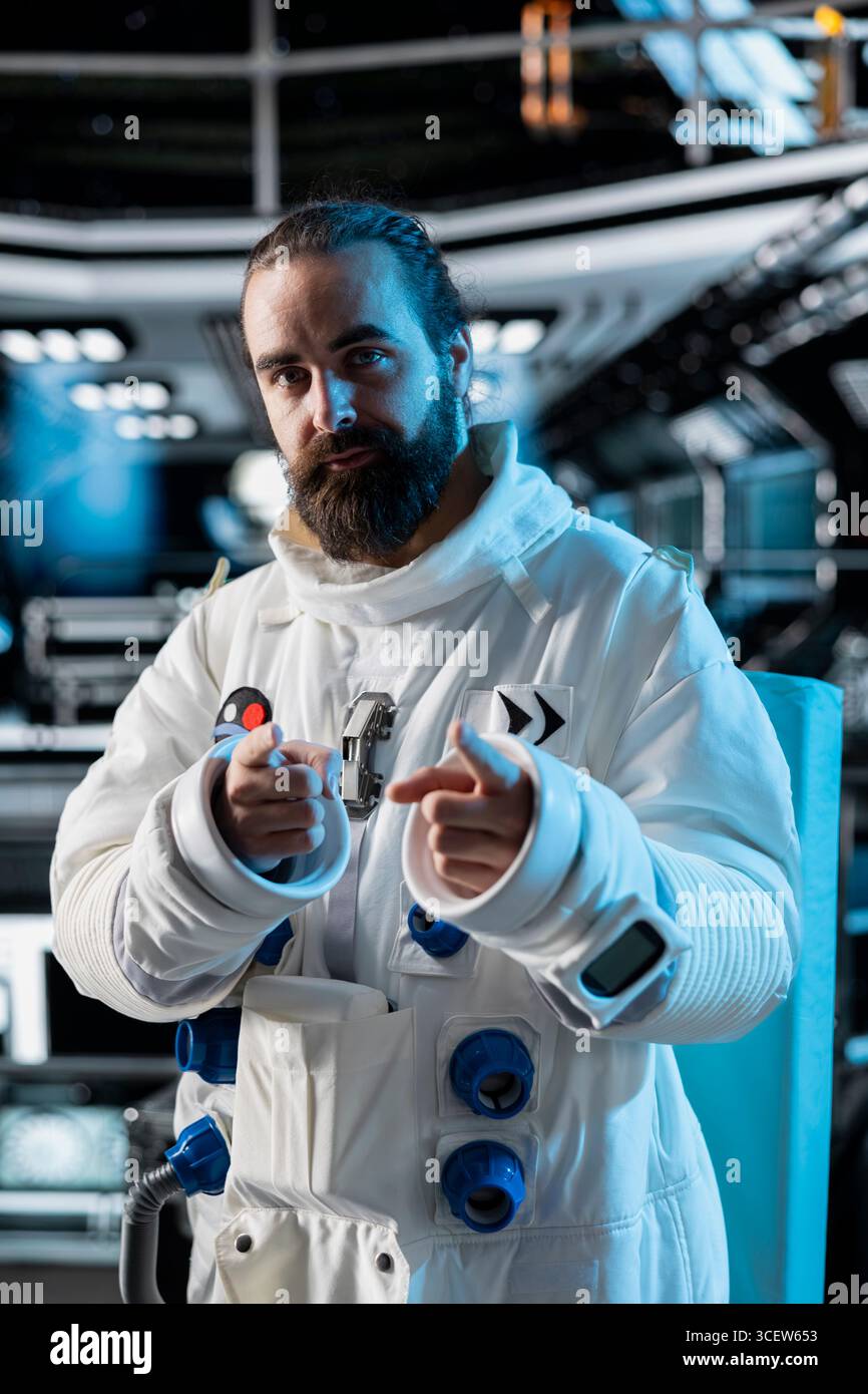 Portrait of astronaut talking with command center on Earth during remote videocall from orbit ...