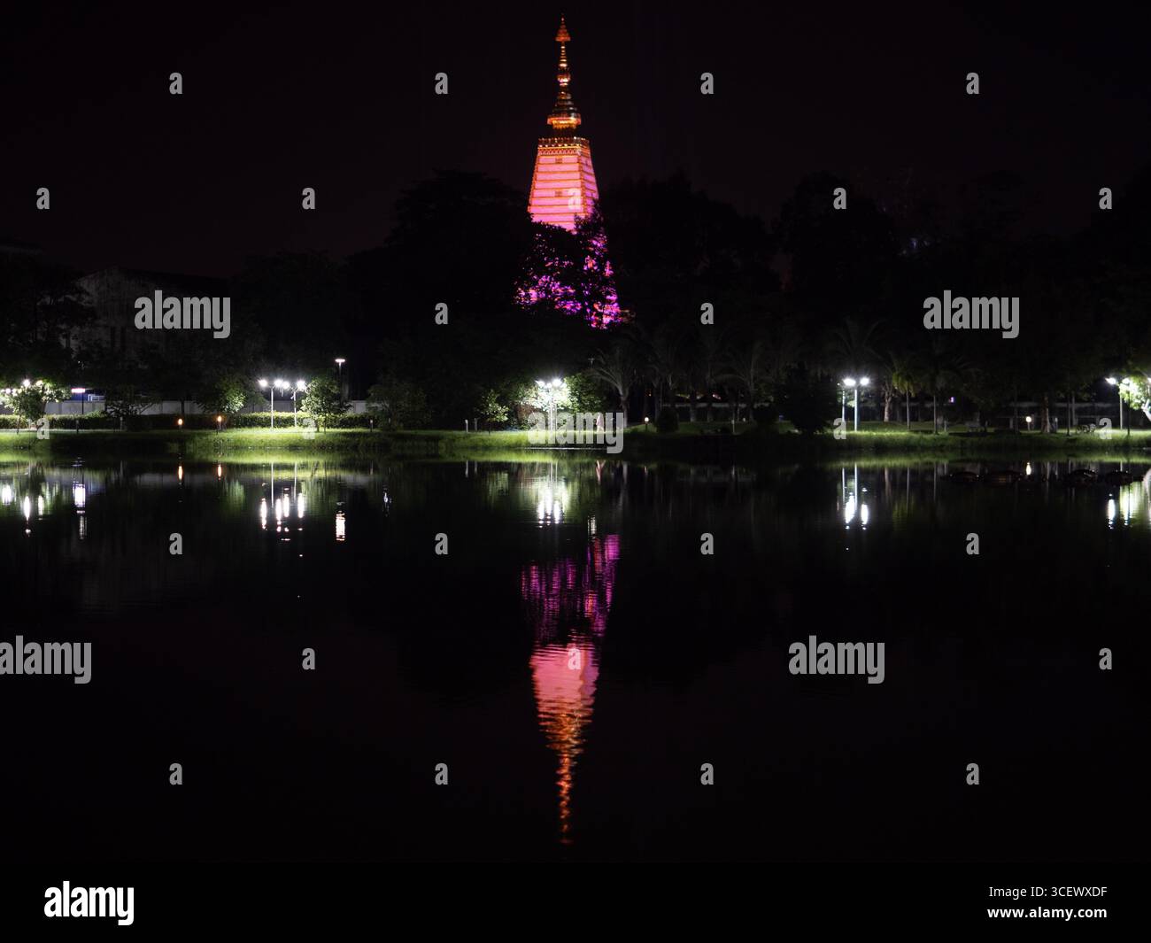 View of Wat Phra That Nong Bua Buddhist temple at night from Nong Bua ...