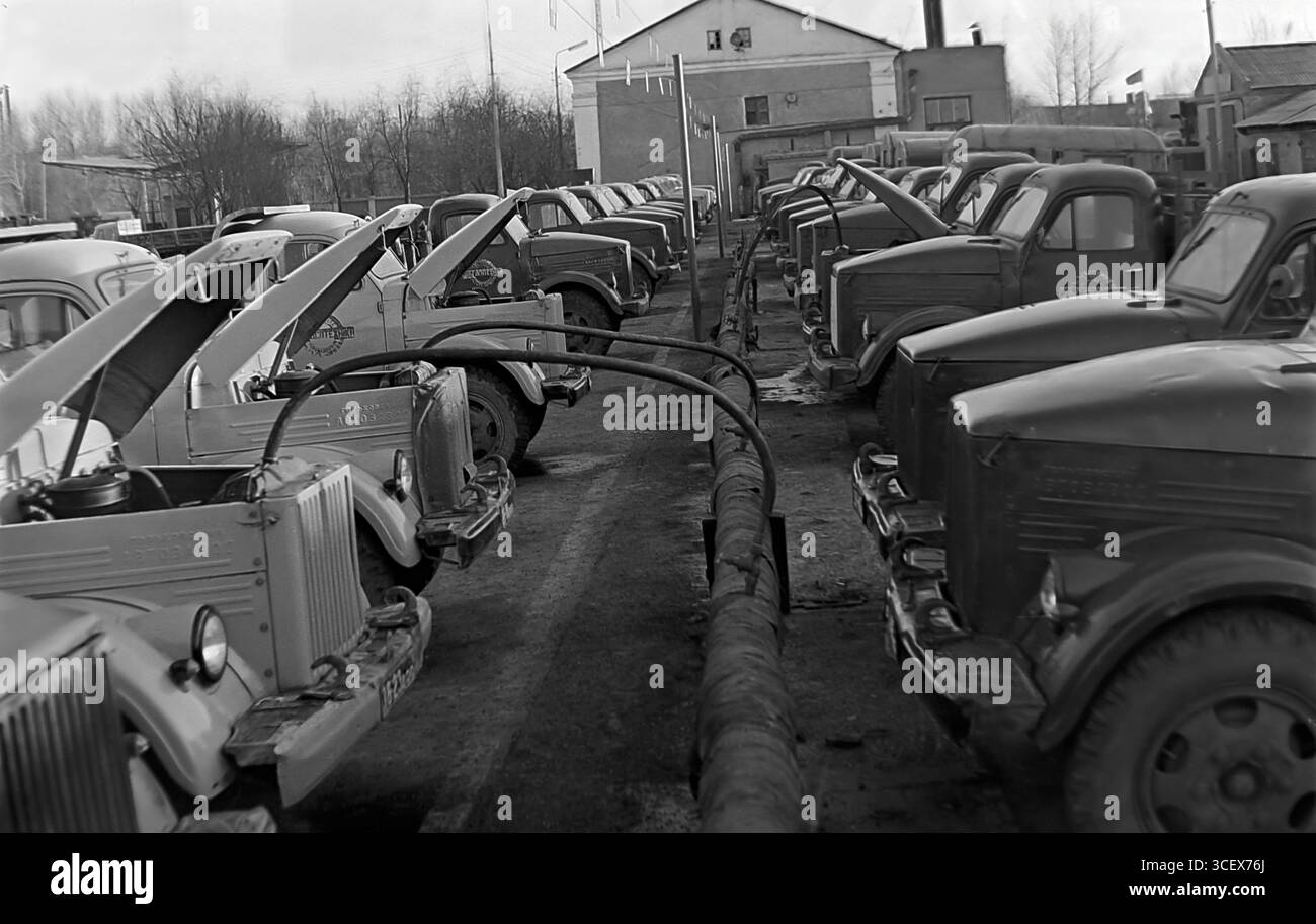 Mechanics inspect repair vintage motor hi-res stock photography and ...