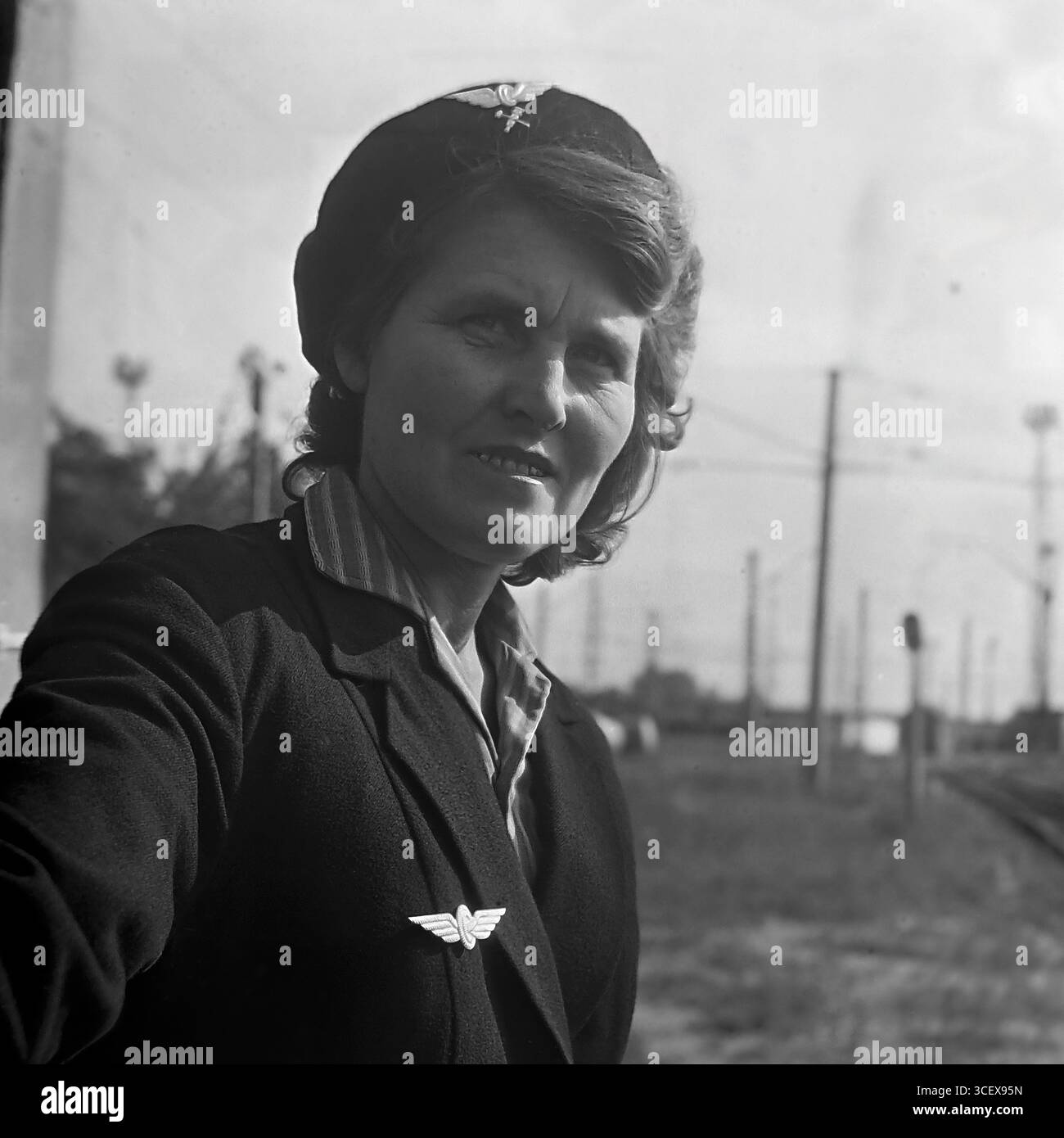 Portrait of a female employee of the Donetsk Railway in uniform at ...