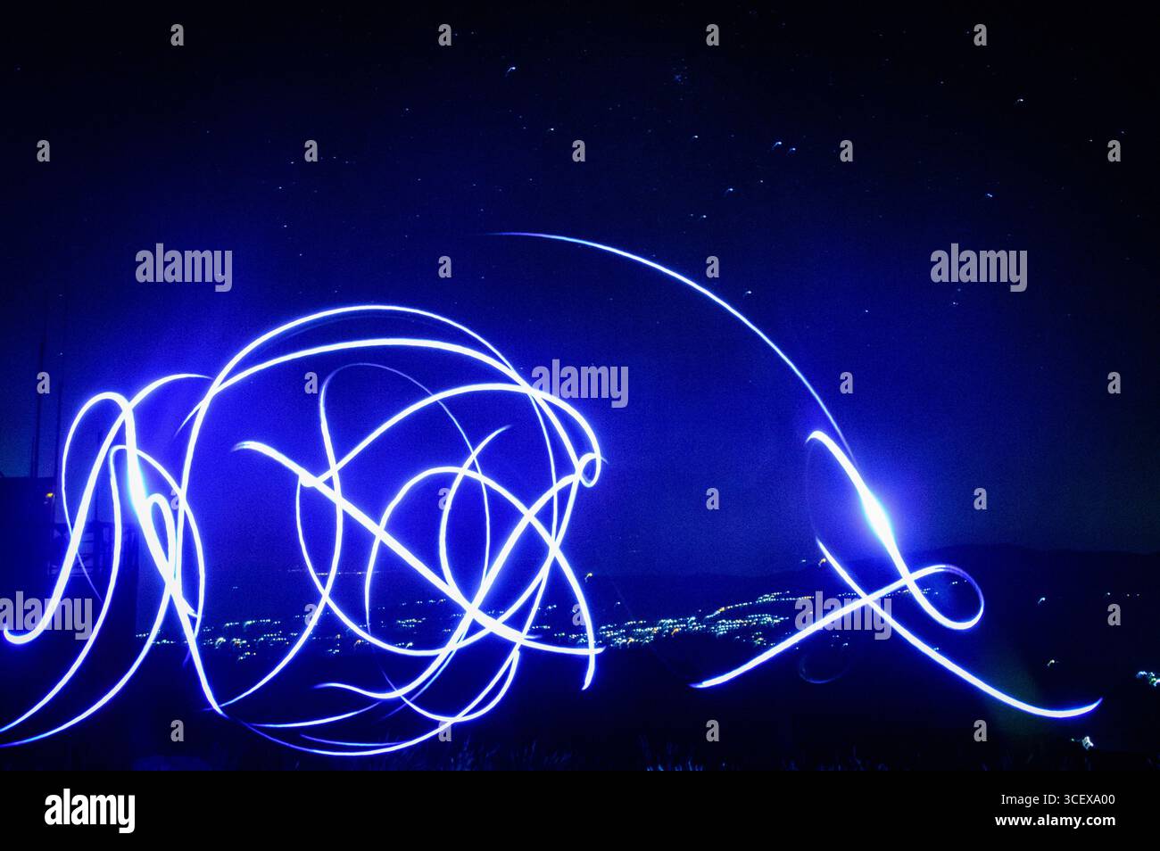 Abstract swirling lights forming circular hi-res stock photography and ...